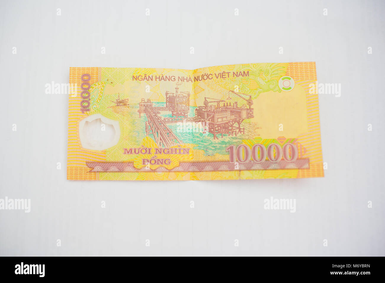 Vietnamese currency 10,000 dong banknote isolated on white background ...