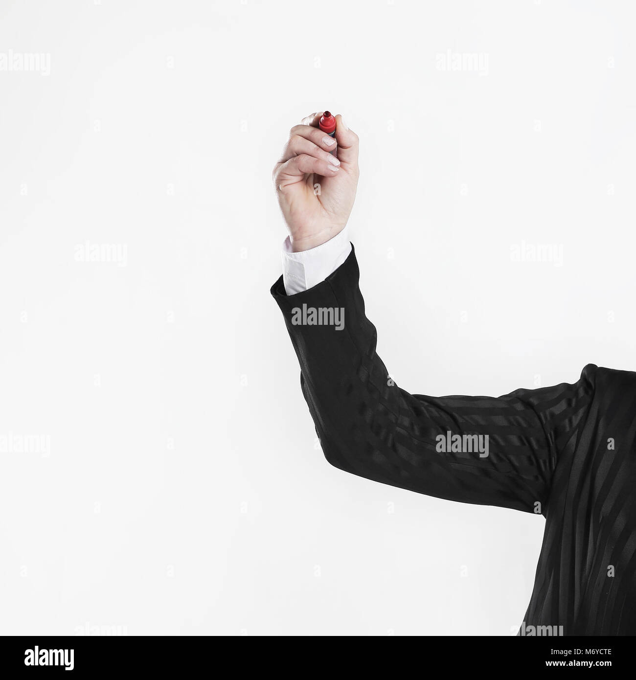 modern business woman pointing at a virtual point.isolated on white ...