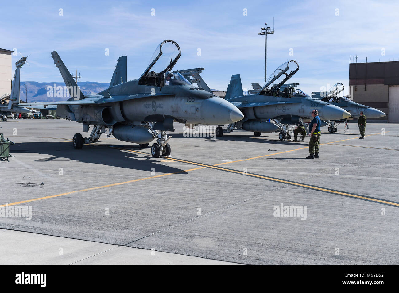 Royal Canadian Air Force CF-18 Hornets park on the flightline at ...