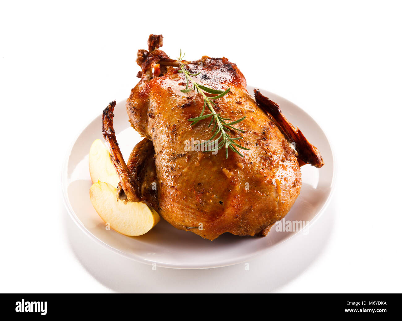 Roast duck on white background Stock Photo - Alamy