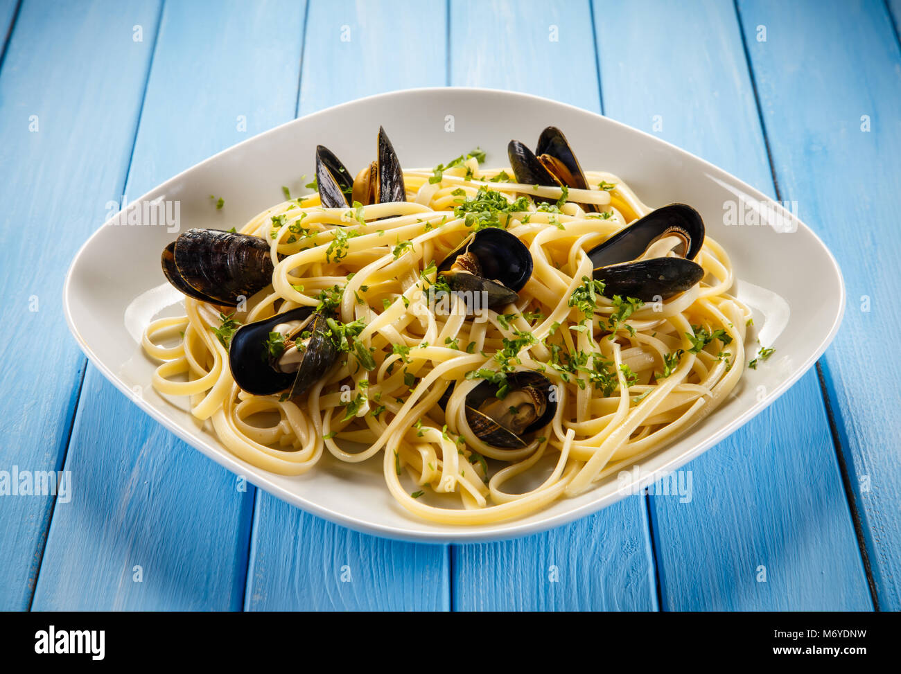 Cooked mussels and pasta Stock Photo - Alamy