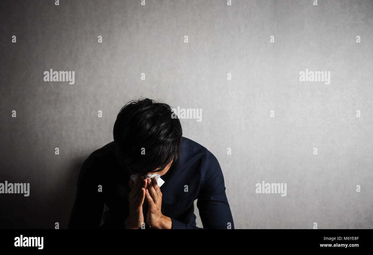 Man crying tissue hi-res stock photography and images - Alamy