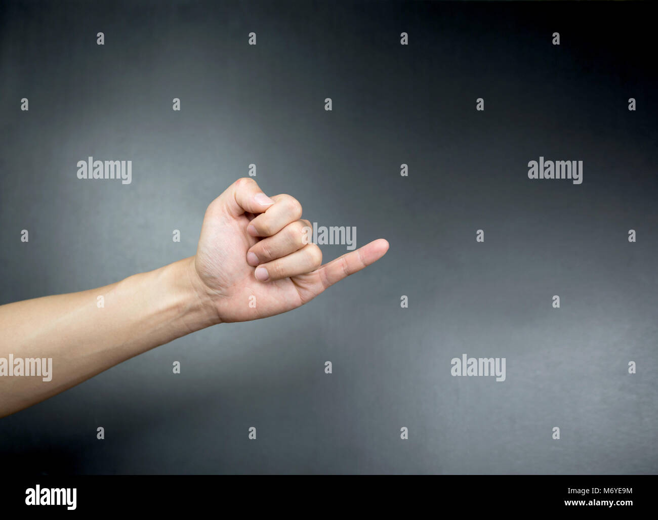 Pinky swear on grey background Stock Photo - Alamy