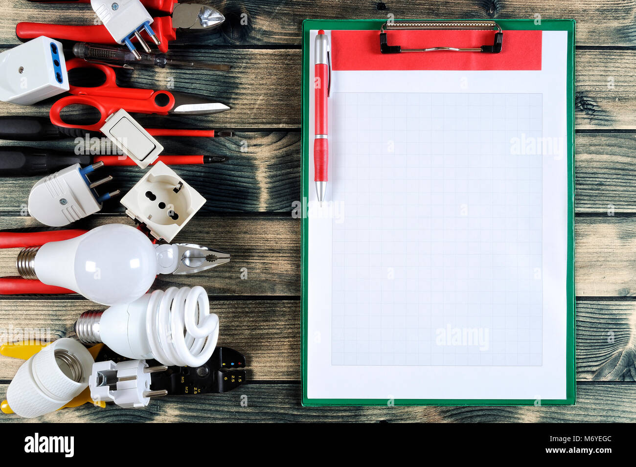 Close up of work tools and electrical equipment on an antique wooden ...