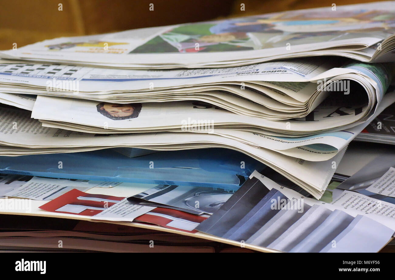 Pile of old newspapers and magazines Stock Photo - Alamy