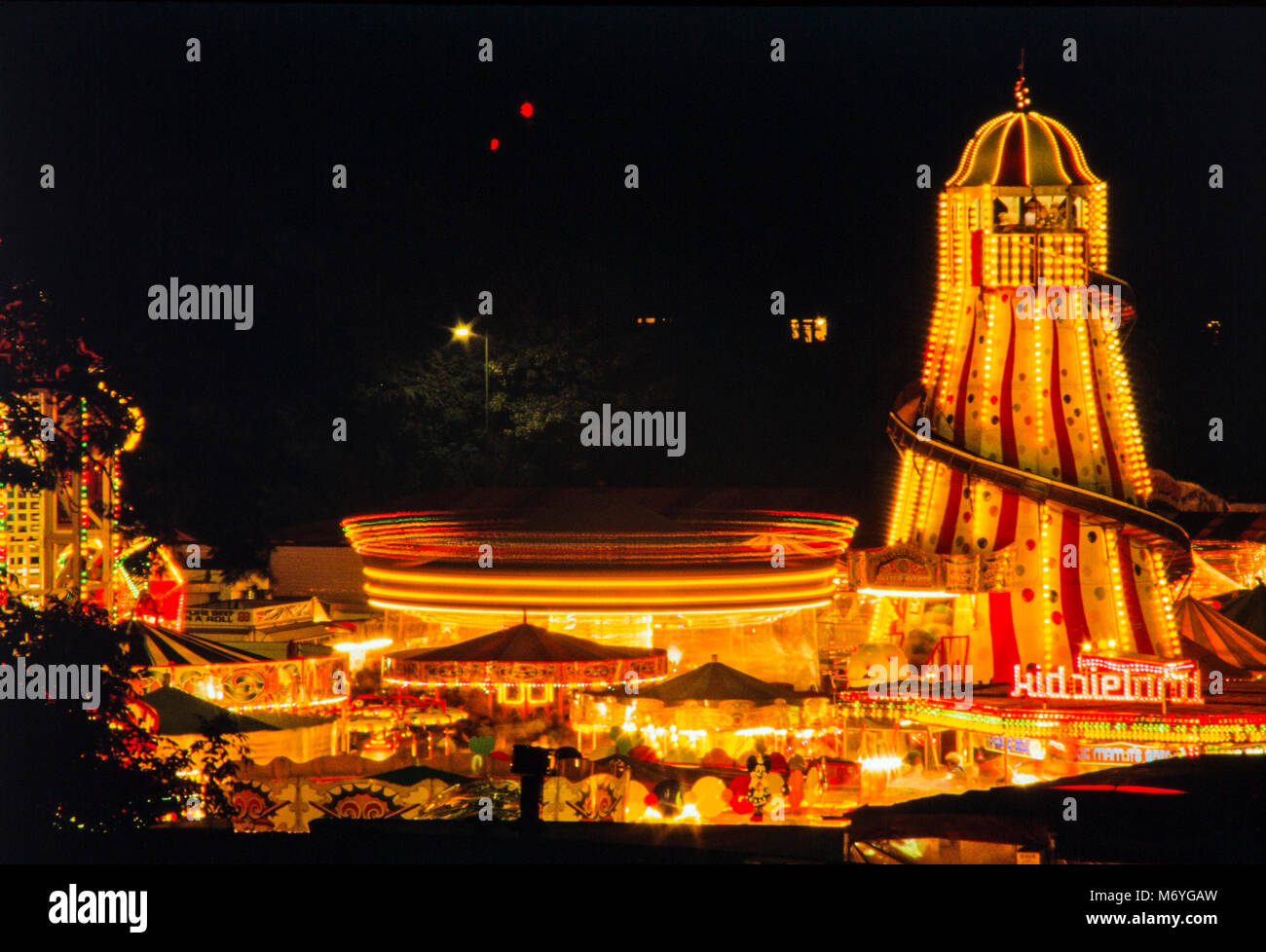 Overview at night of Nottingham Goose Fair, an annual travelling ...