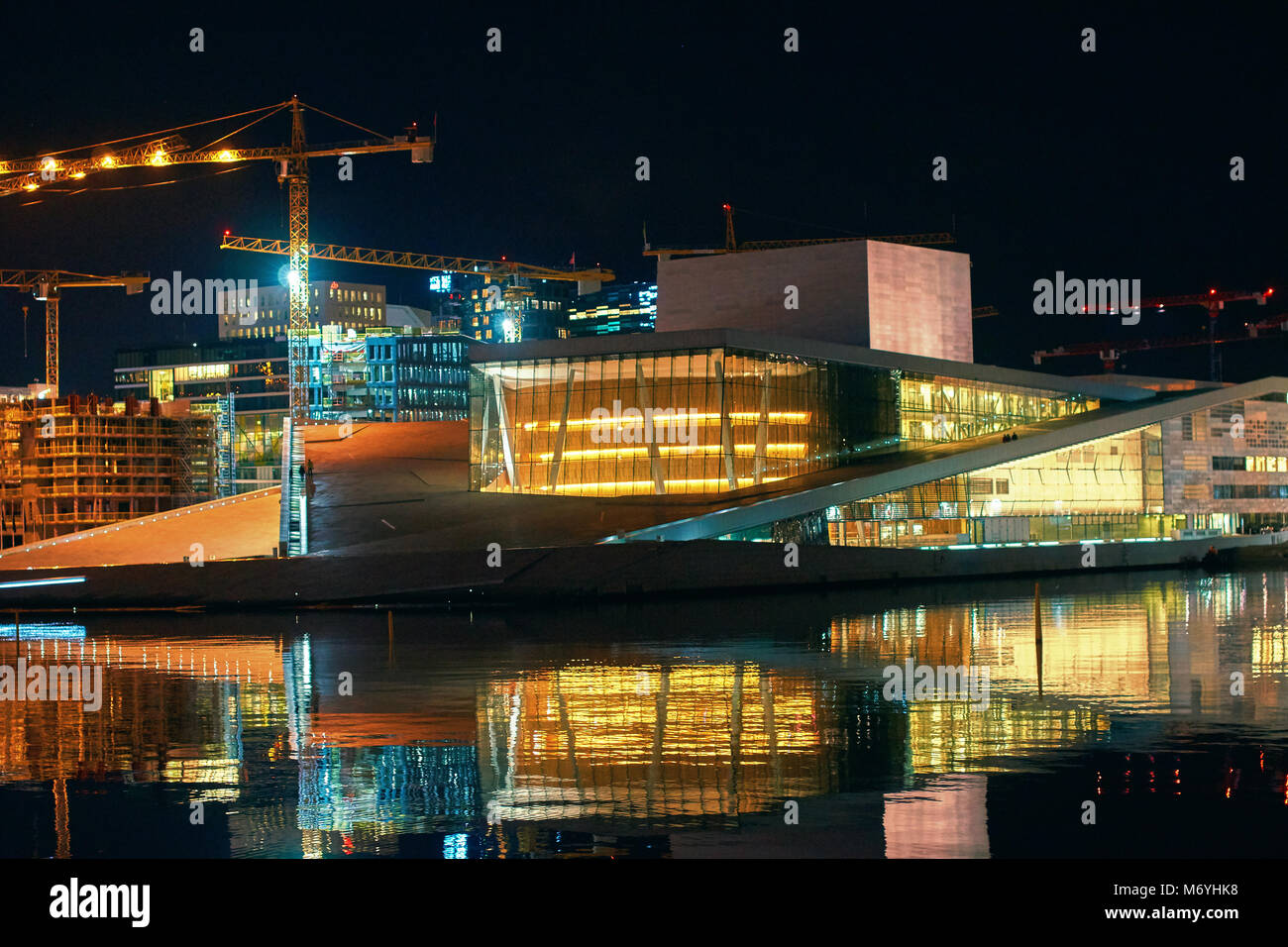 Night view of architectural award-winning National Oslo Opera House ...
