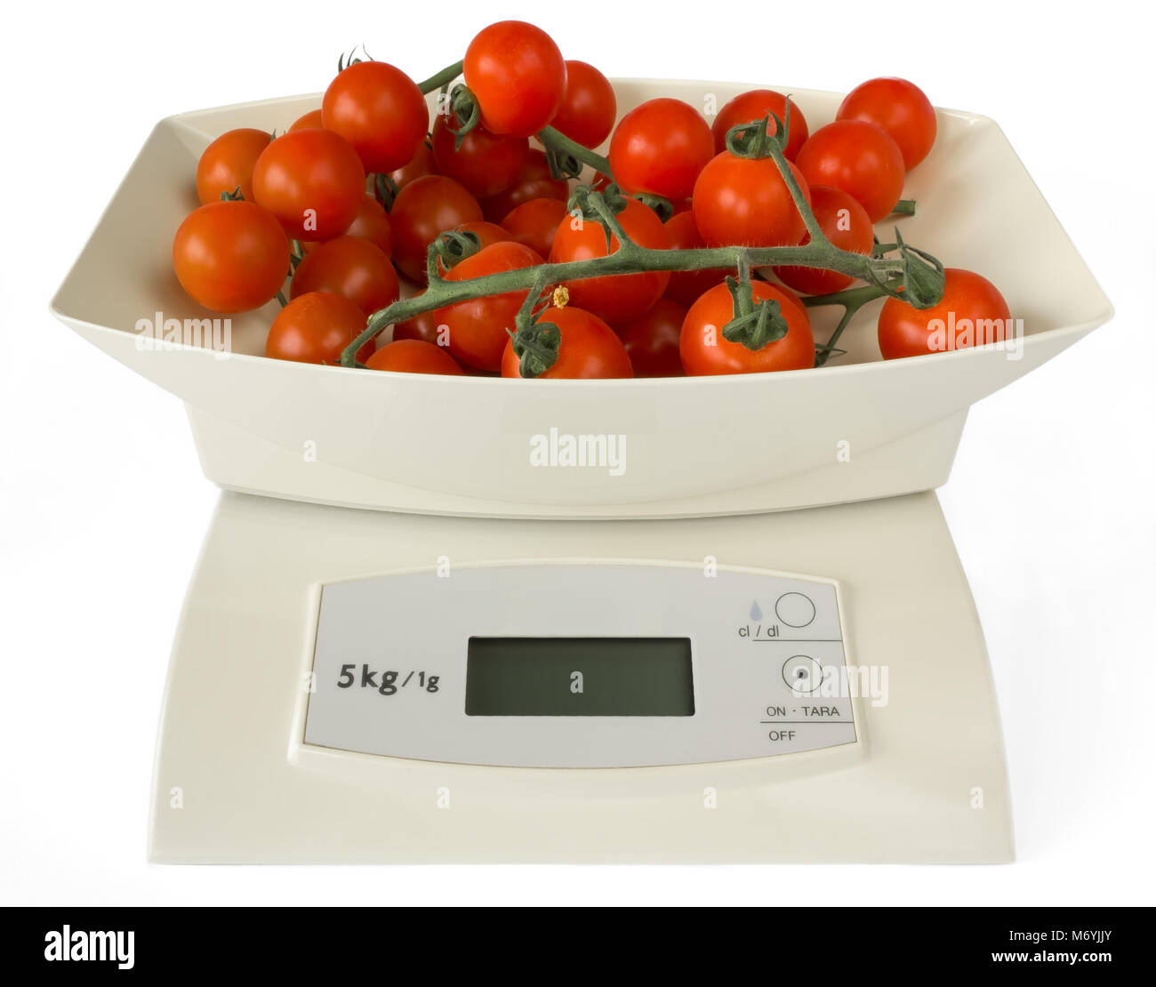 Isolated electronic kitchen weighing scales with tomatoes Stock Photo ...