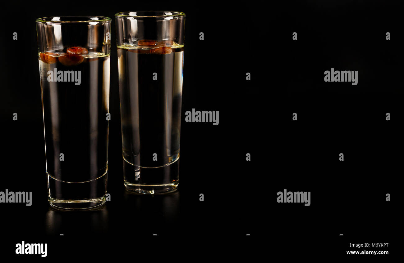 aromatic anise alcohol with coffee beans in a glass, drink set, party ...
