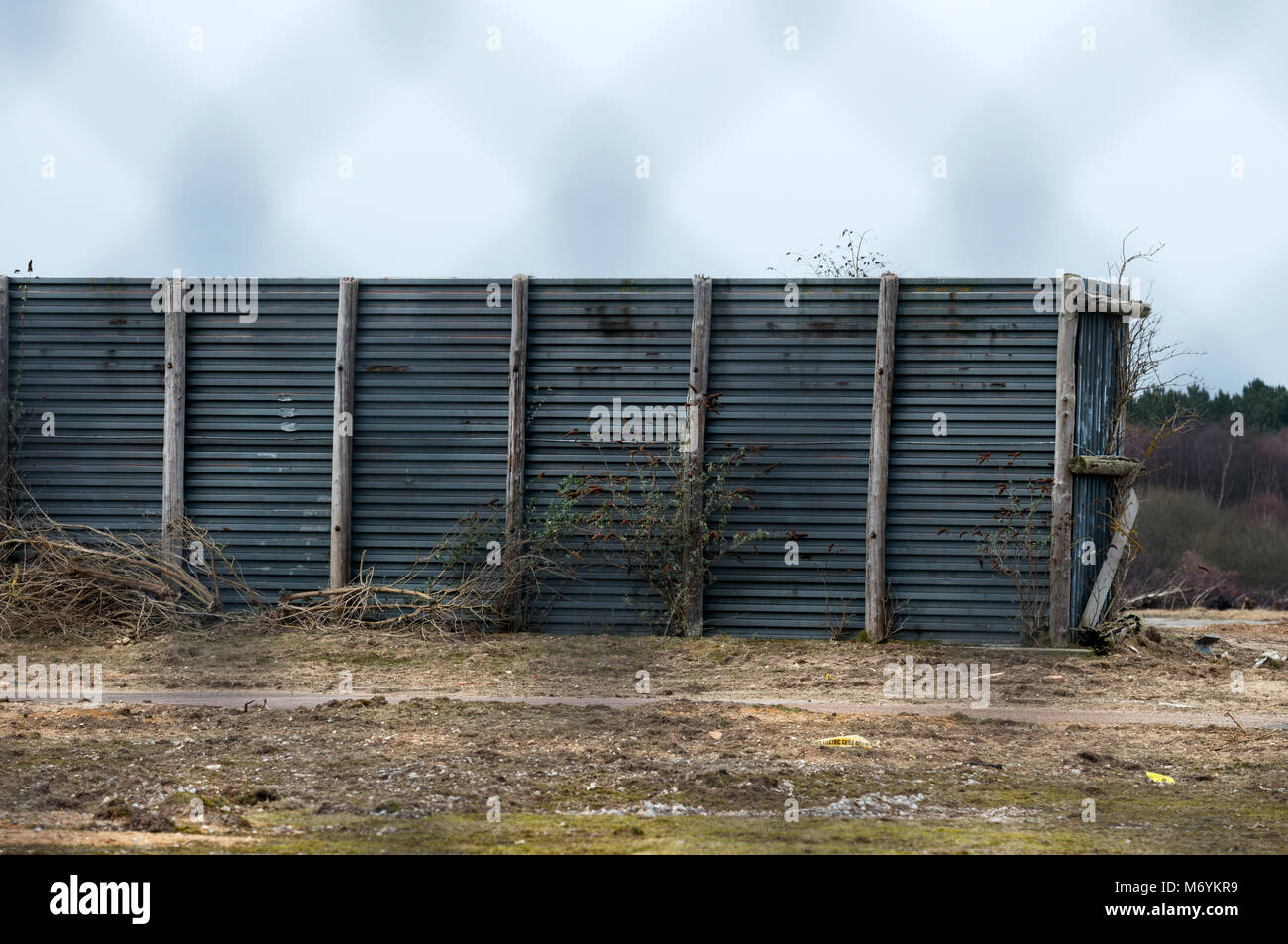 Jet Engine blast wall at a disused Cold War airbase Stock Photo - Alamy