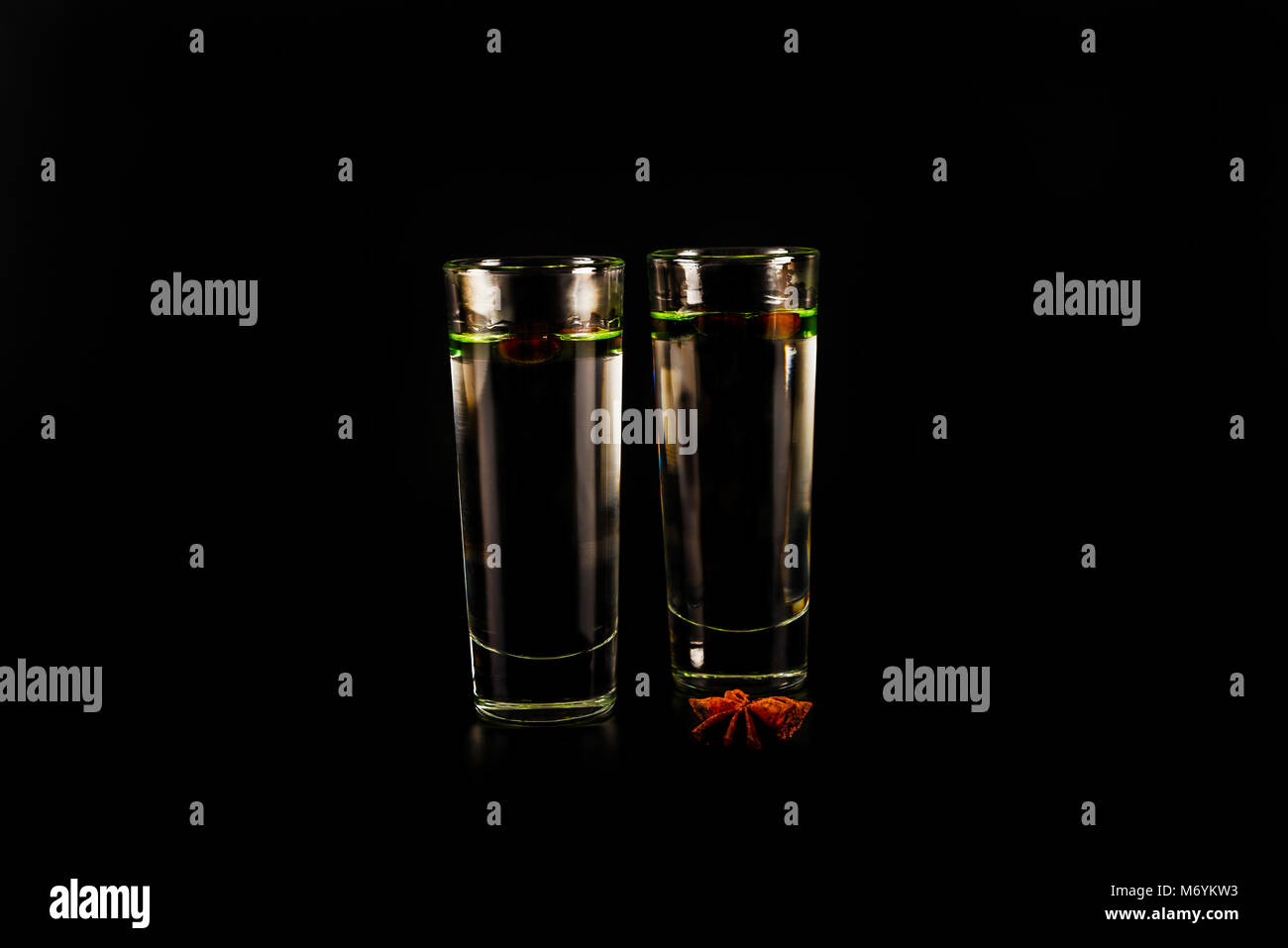 aromatic anise alcohol with coffee beans in a glass, drink set, party ...