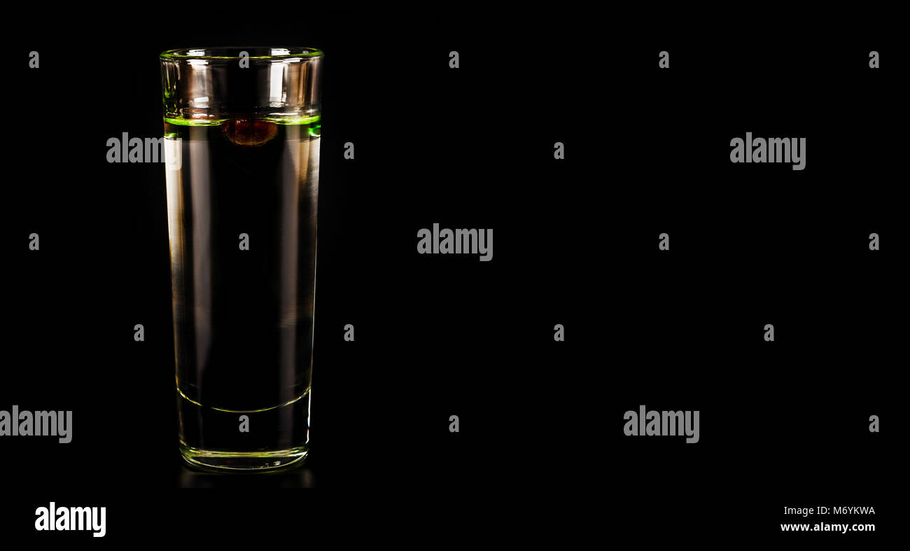 aromatic anise alcohol with coffee beans in a glass, drink set, party ...