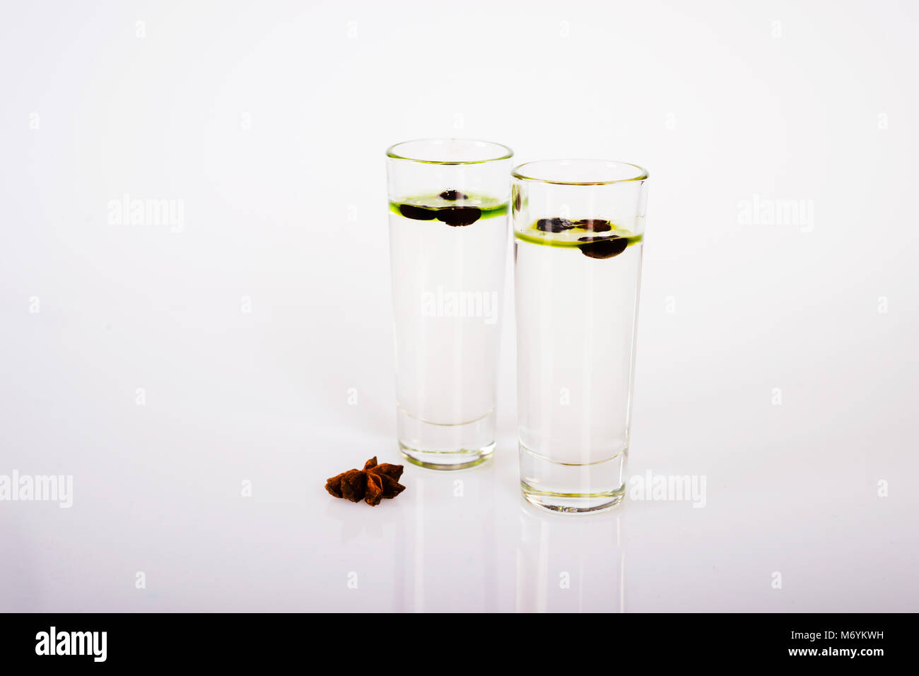 aromatic anise alcohol with coffee beans in a glass, drink set, party ...