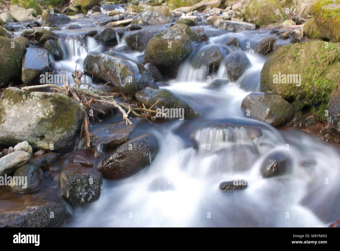 Gentle Streams flow fast Stock Photo - Alamy