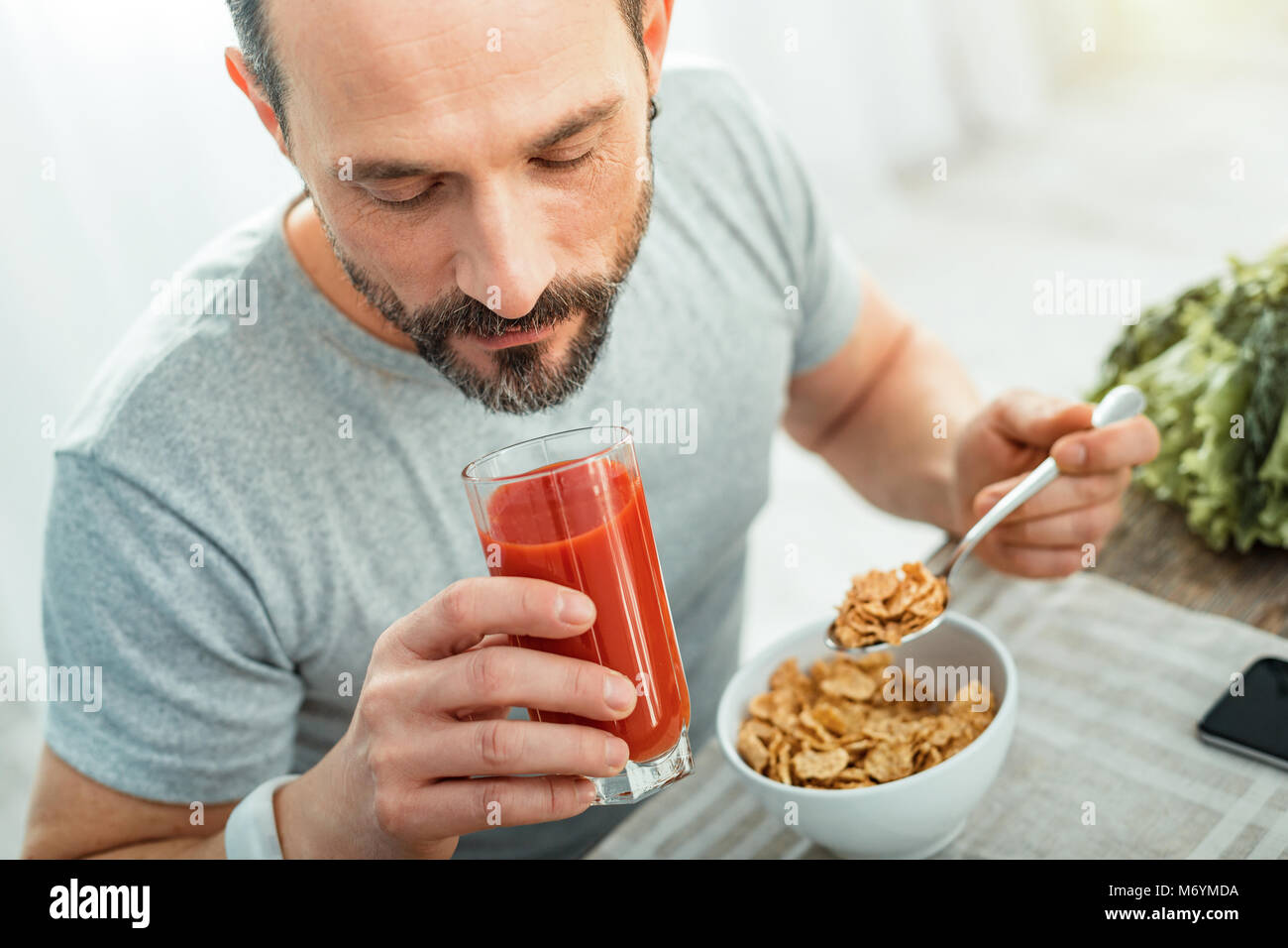 Man eating healthy food calm hi-res stock photography and images - Alamy