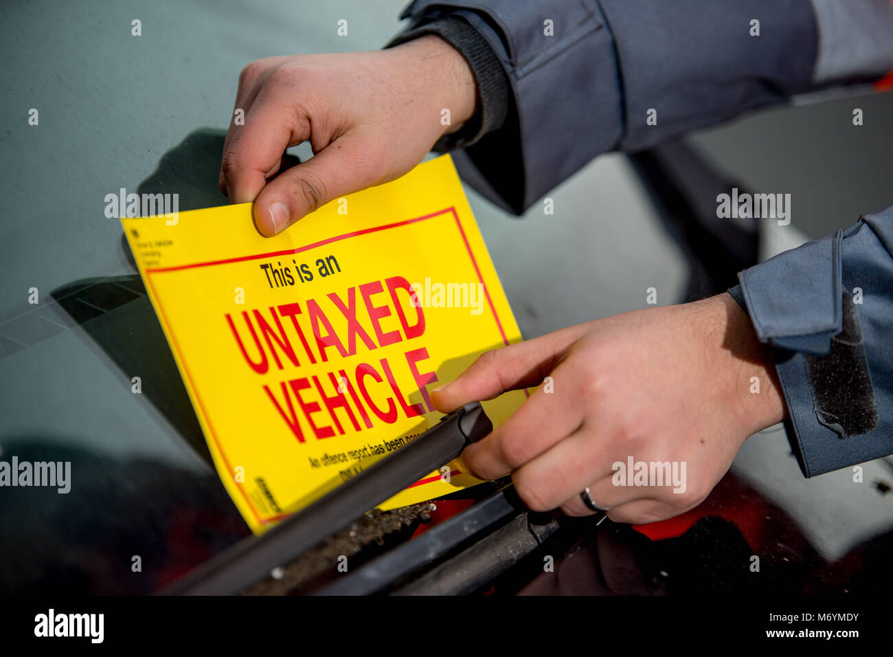 Wheel clamping of untaxed vehicles is becoming more common with the ...