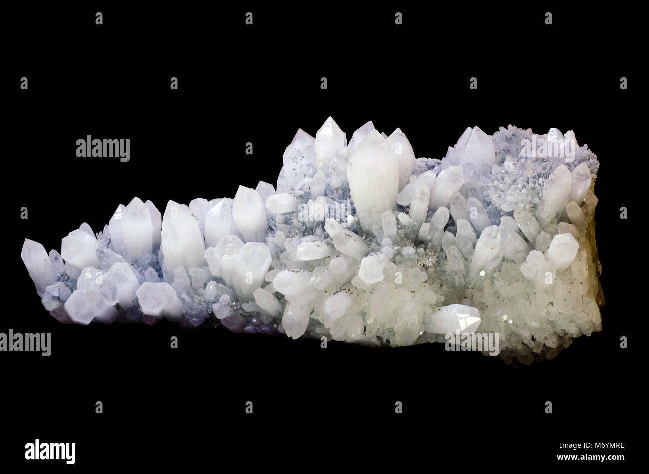 Pure Quartz Crystal cluster on black background. This is a huge ...