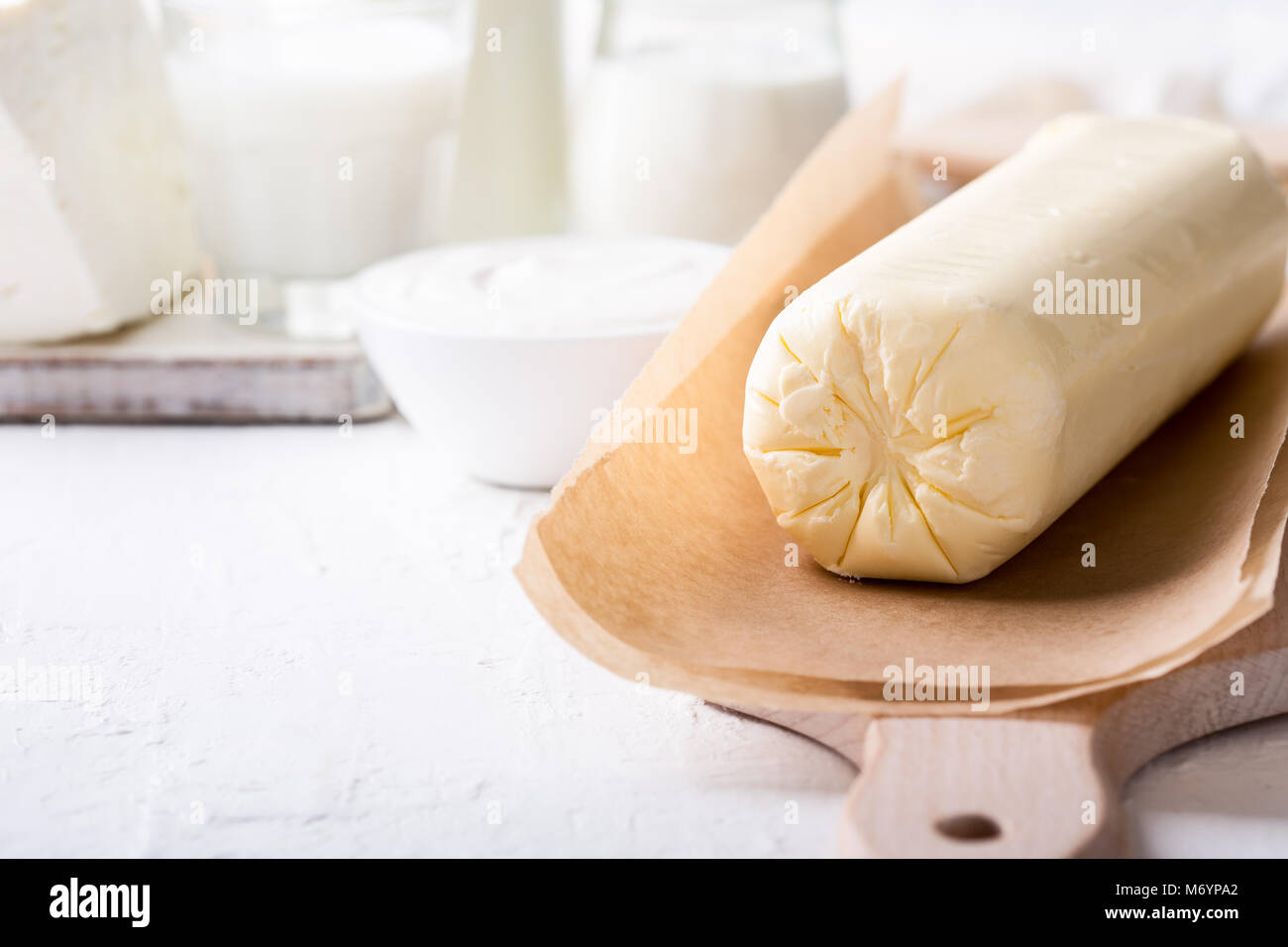 Fresh handmade farm butter on wooden board, homemade organic dairy ...
