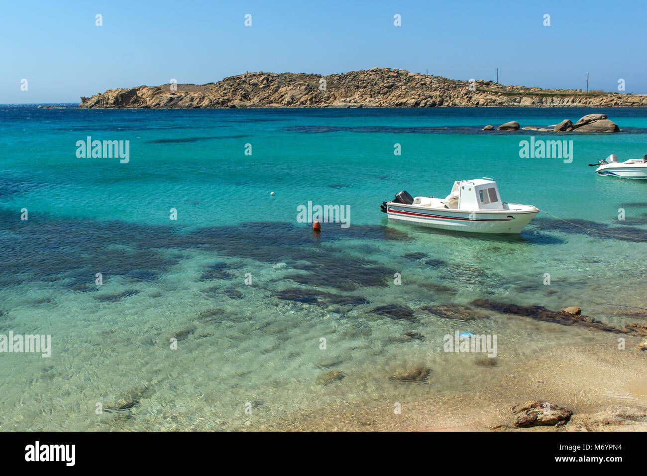 Small boat in Paranga Beach on the island of Mykonos, Cyclades, Greece ...