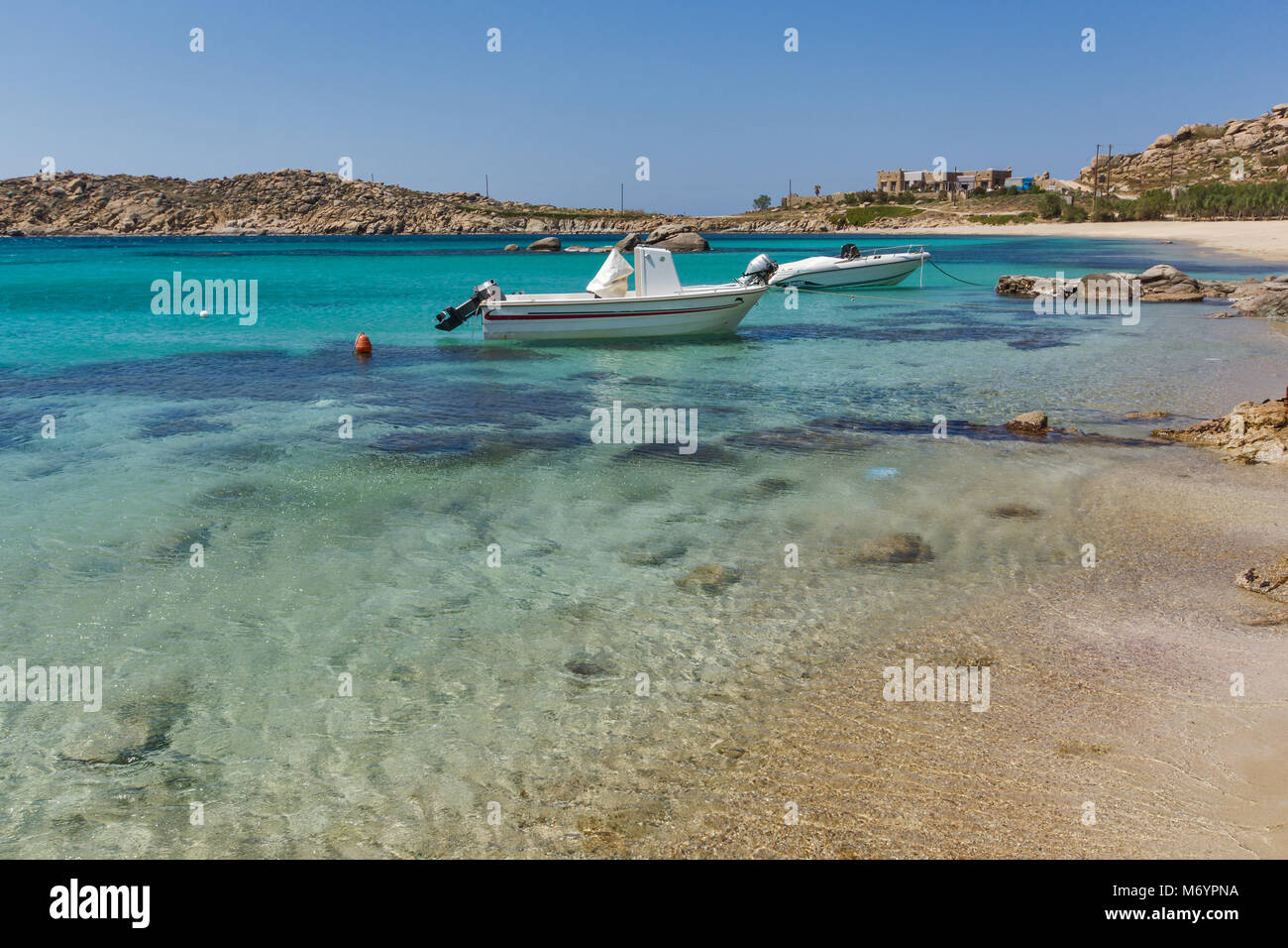 Small boat in Paranga Beach on the island of Mykonos, Cyclades, Greece ...