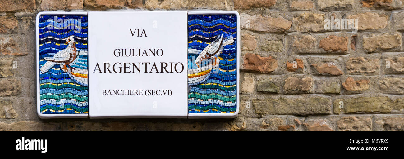 Decorative street sign on the building from Ravenna, Italy Stock Photo ...