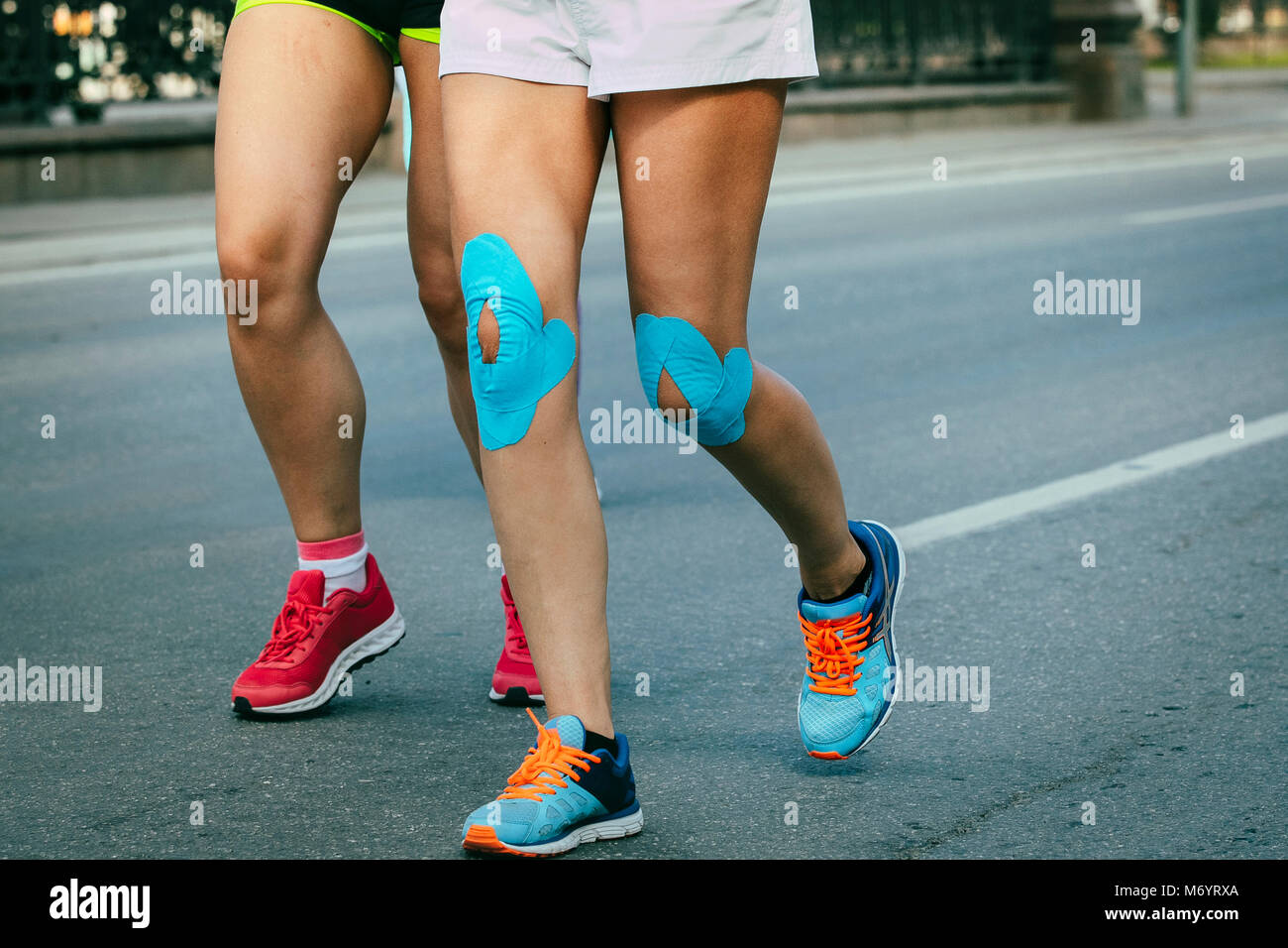 Woman blue kinesiology tape hi-res stock photography and images - Alamy