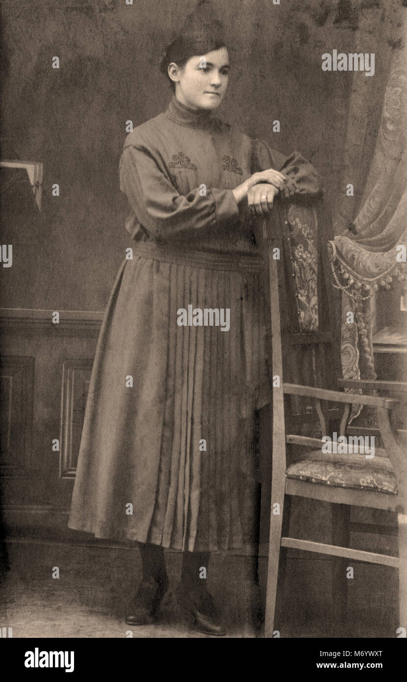 Vintage portrait of a young girl. The shot was taken around 1913 year ...
