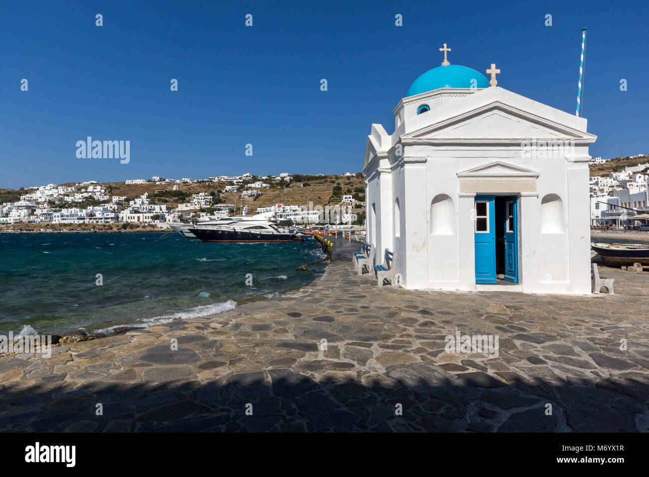 Small orthodox church on the port of town of Mykonos, Cyclades, Greece ...