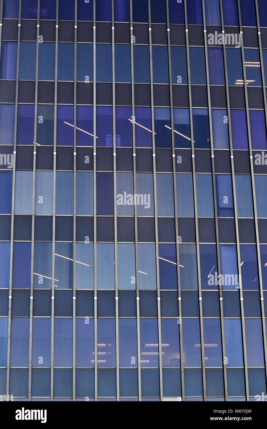 Office building with square, glass windows Stock Photo - Alamy