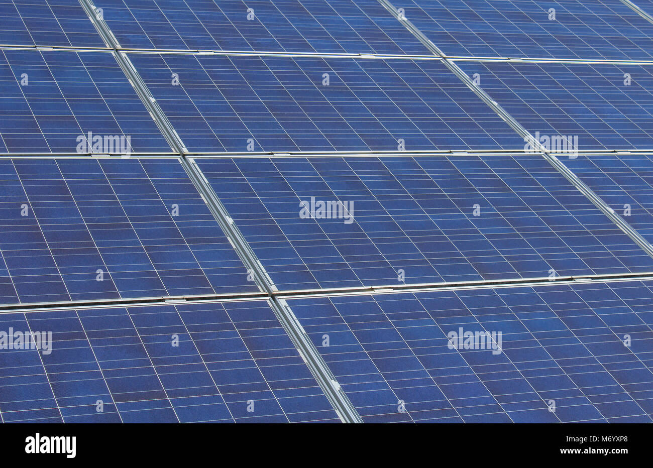 Detailed photo to photovoltaic solar panels in metal frame Stock Photo ...