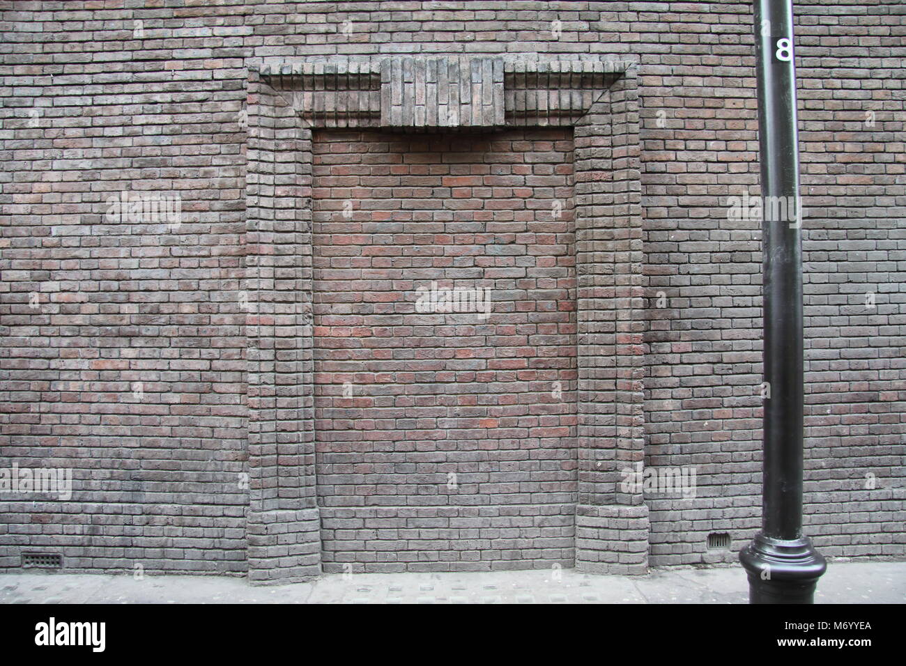 Bricked up doorway in central london Stock Photo - Alamy