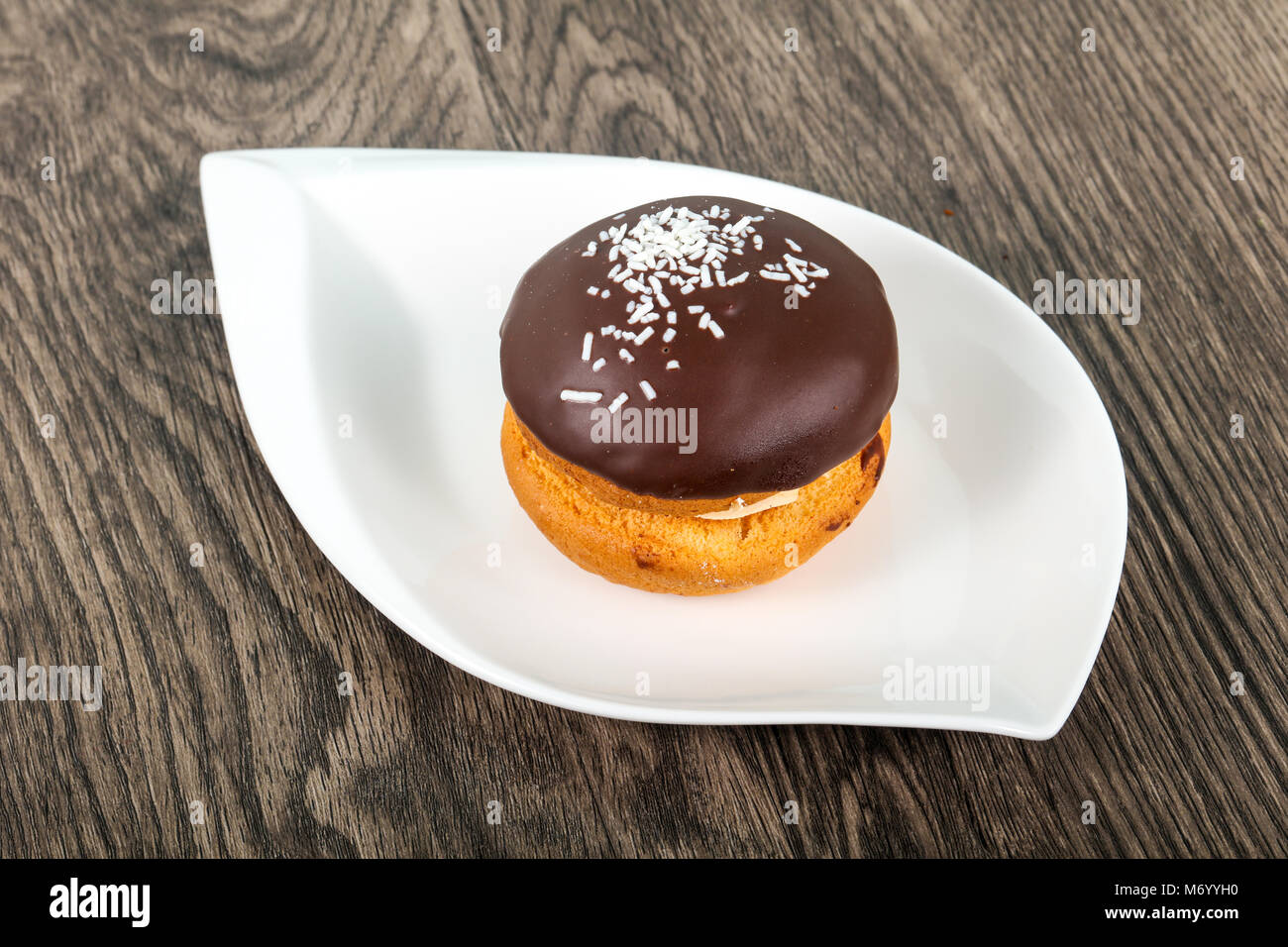 Bouchee cake with chocolate Stock Photo - Alamy
