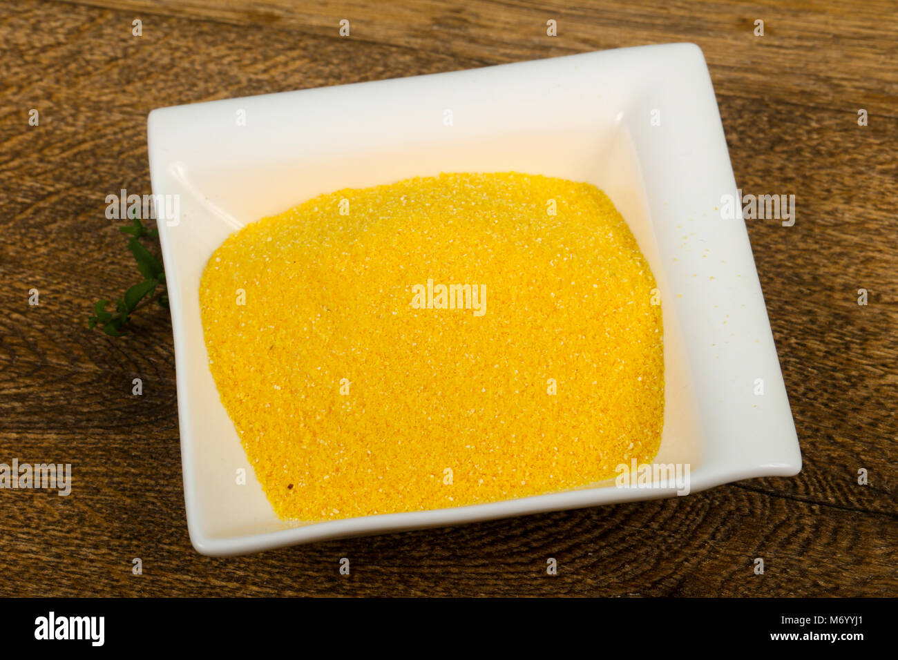 Raw polenta ready for cooking Stock Photo - Alamy