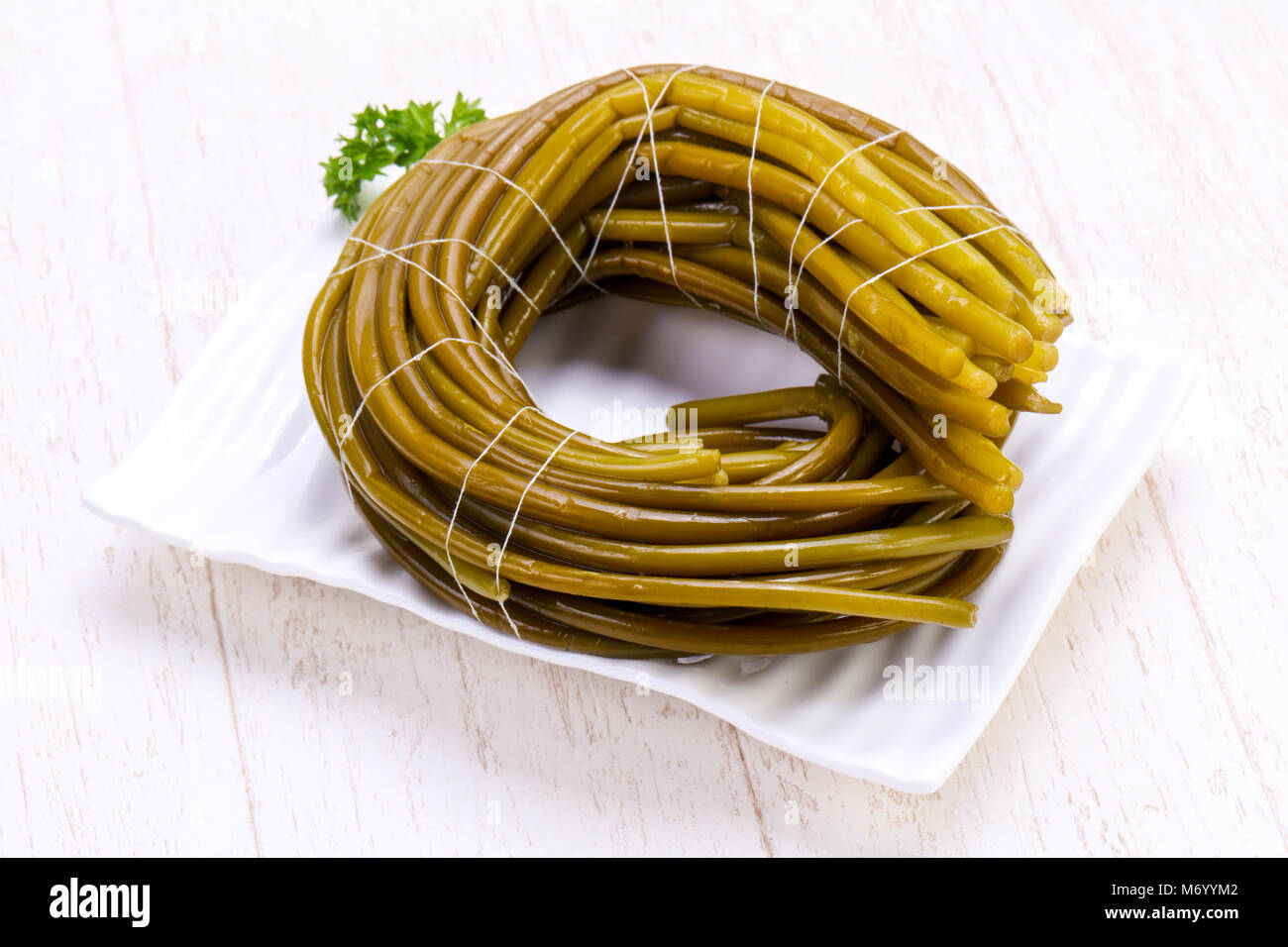 Pickled ramsons heap in the bowl Stock Photo - Alamy