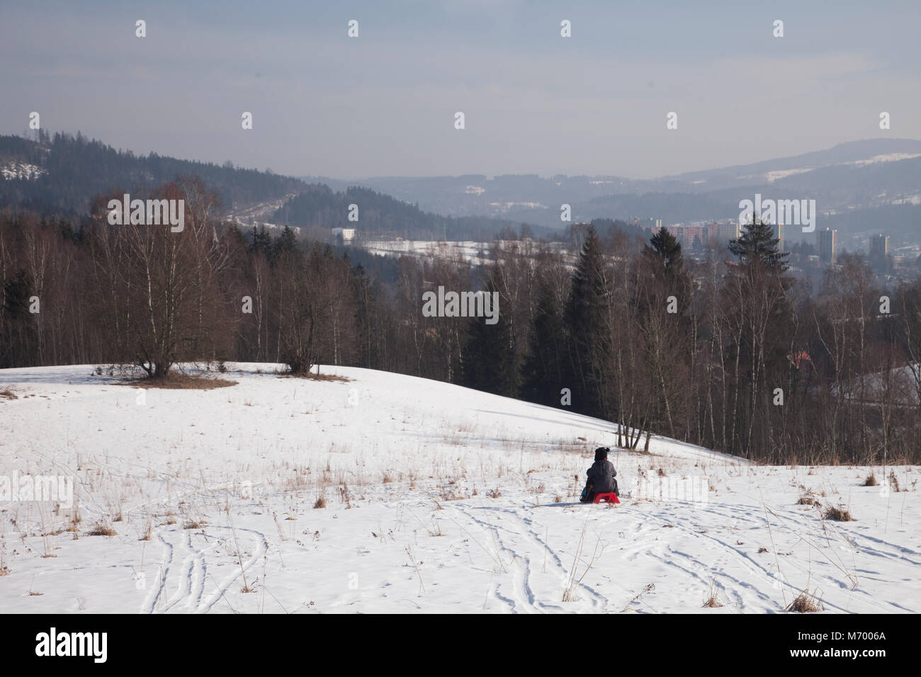 Kids enjoying snowy weather in winter time Stock Photo - Alamy