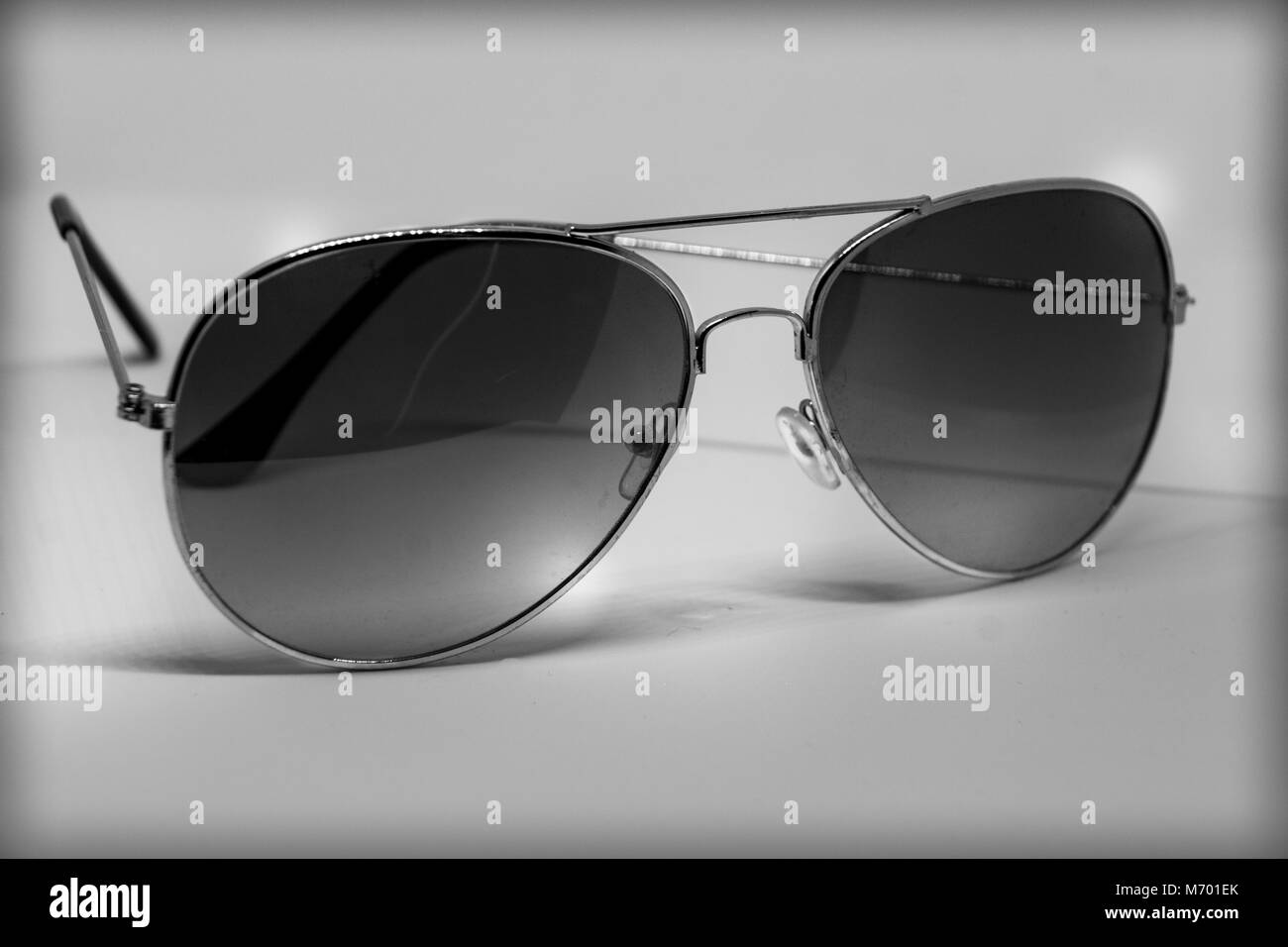 Photograph of a pair of sunglasses in lightbox Stock Photo - Alamy