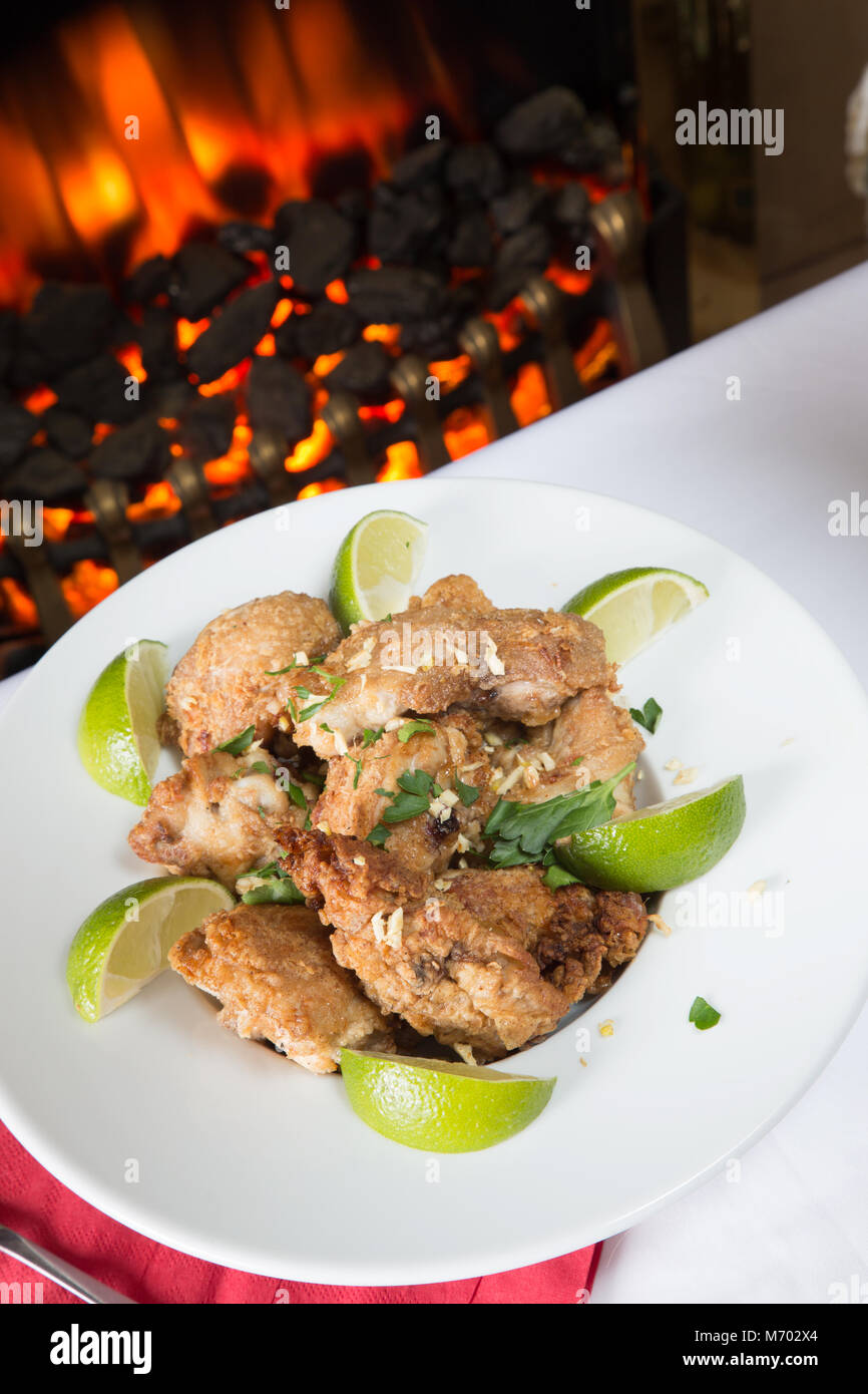 Frango A passarihno, a Brazilian dish of fried Chicken pieces in Lime ...
