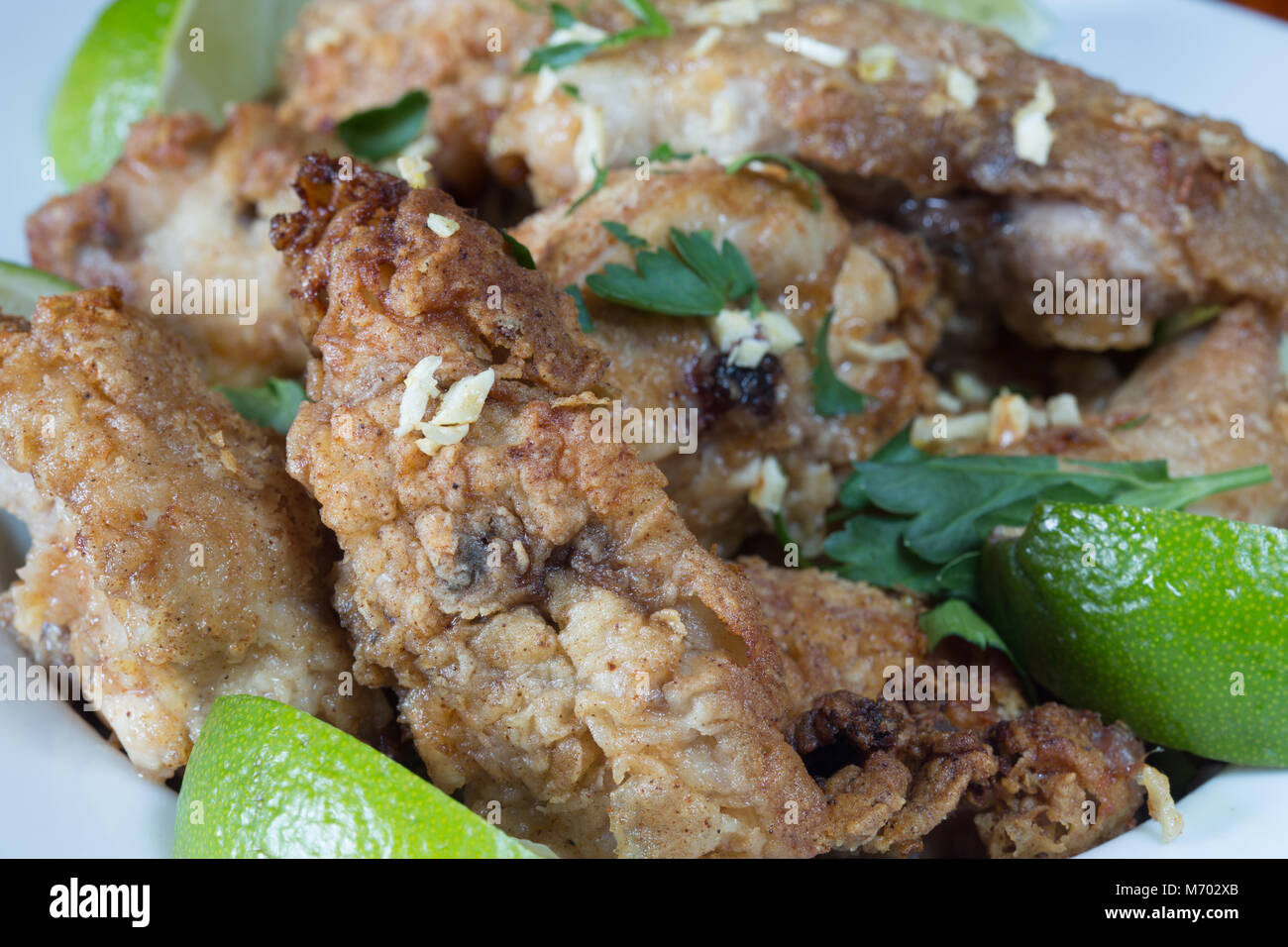 Close up of a Brazilian dish of Frango A passarihno, Fried Chicken ...
