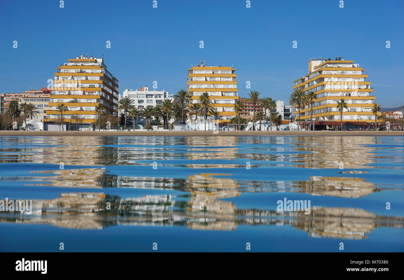 Spain Costa Brava seaside town with apartment buildings on the ...