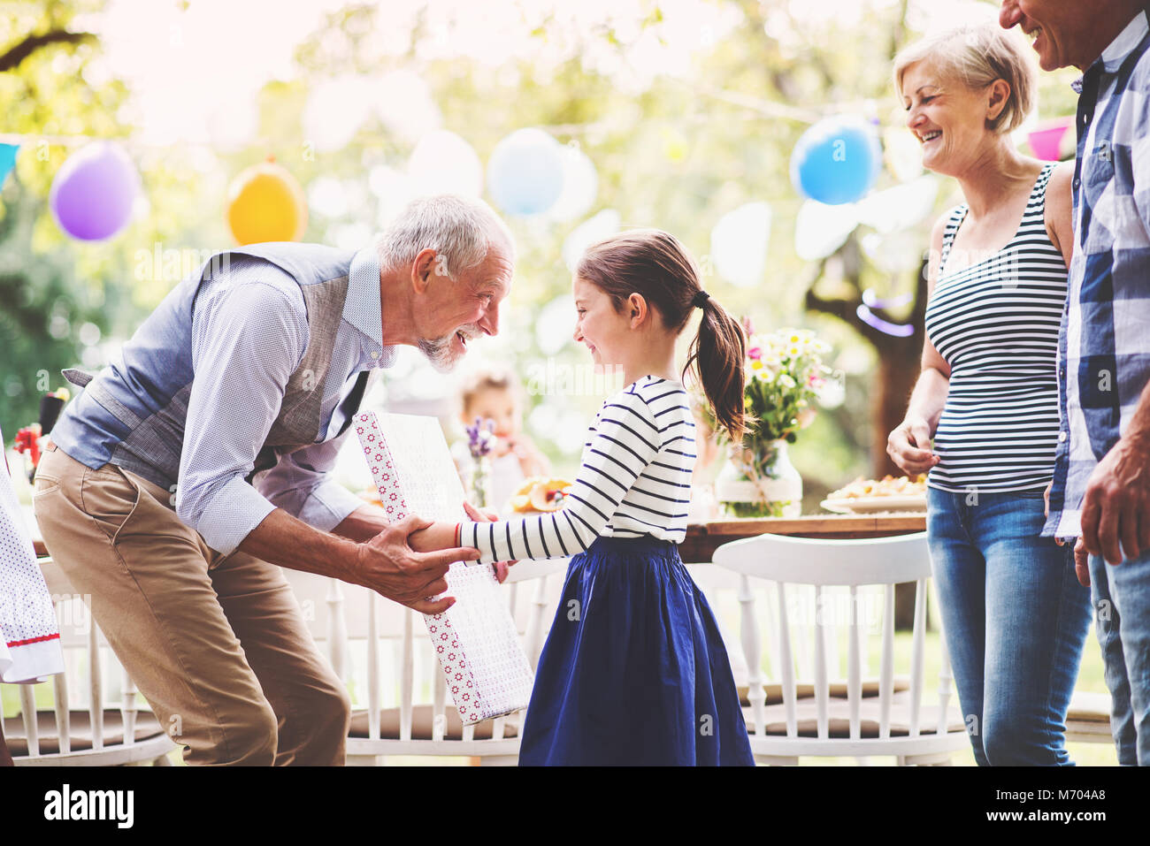 Family celebration or a garden party outside in the backyard Stock ...