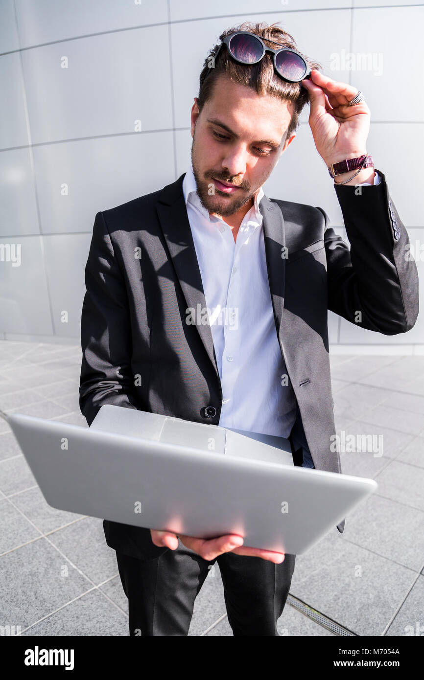 Surprised stylish young employee man hi-res stock photography and ...