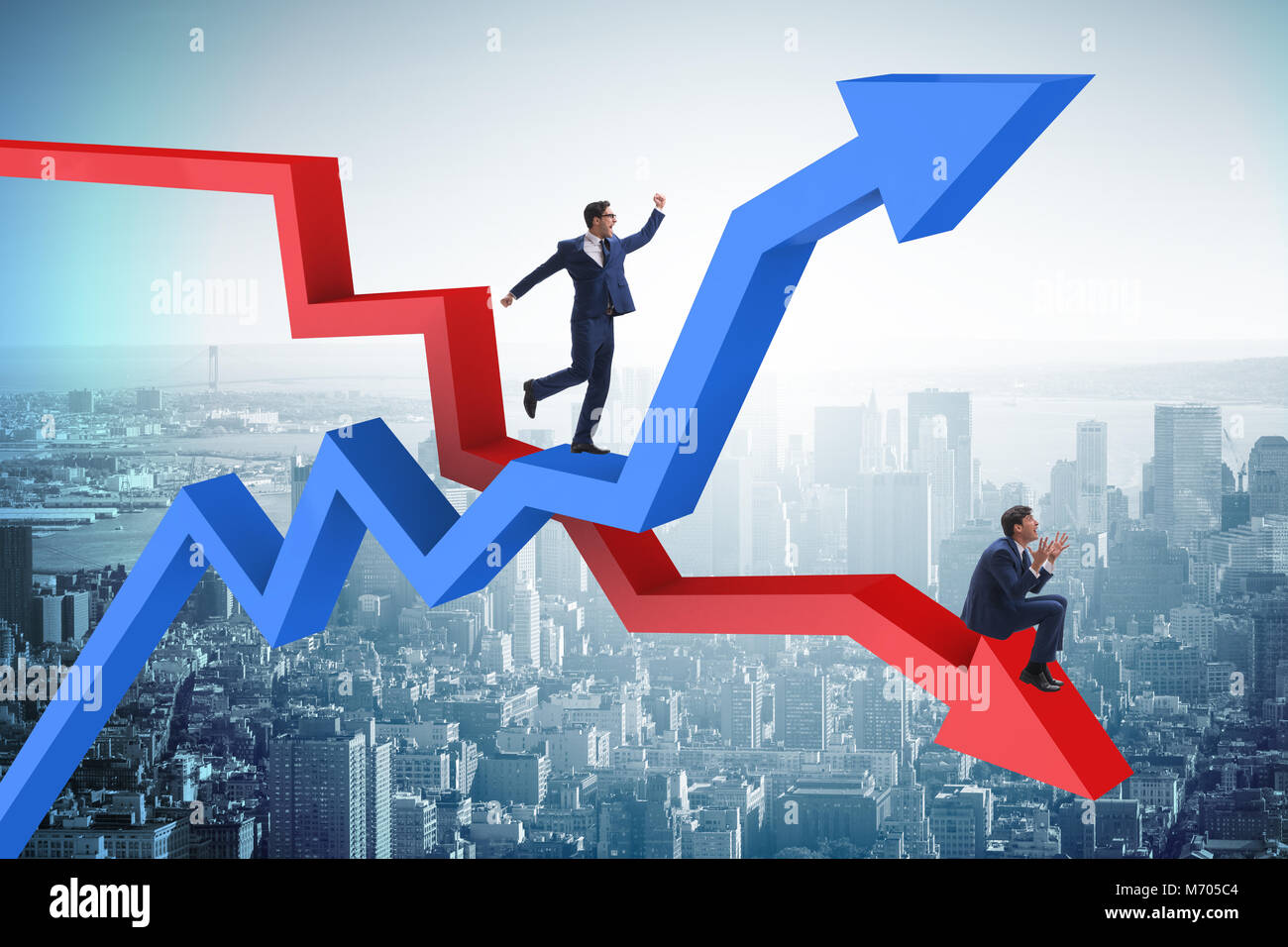 Businessman with charts of growth and decline Stock Photo - Alamy