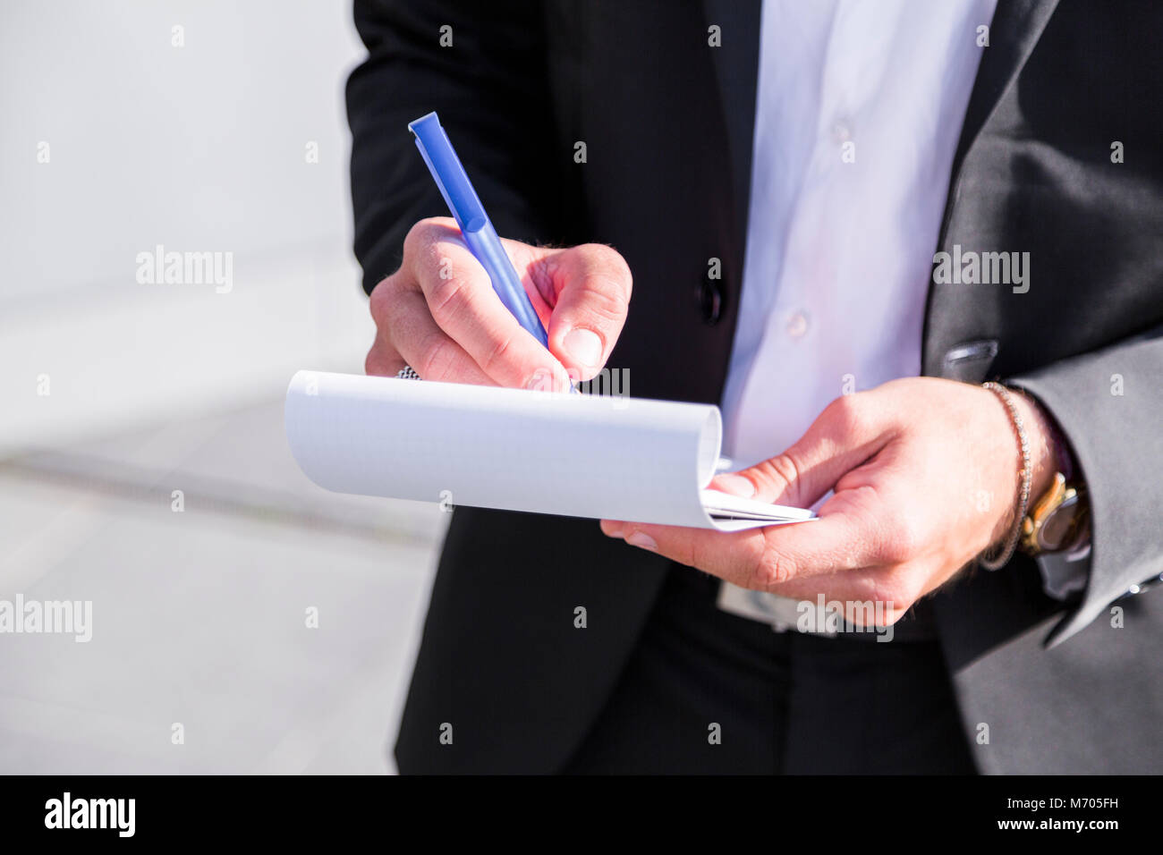 Anonymous no face male businessman or worker in black suit with white ...