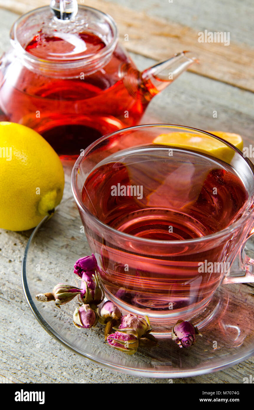 Fruit berry tea in the cup served on table Stock Photo - Alamy