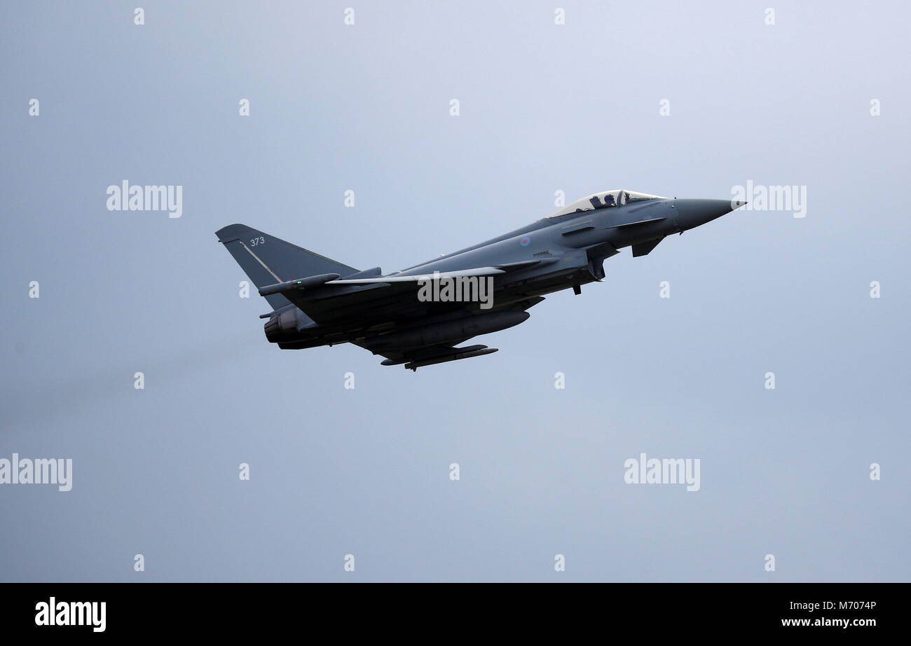 An RAF Typhoon jet takes off during a visit by the Duke of Cambridge to ...