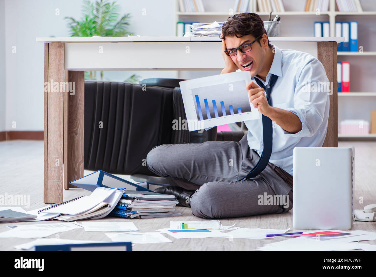 Bankrupt businessman angry in the office floor Stock Photo - Alamy