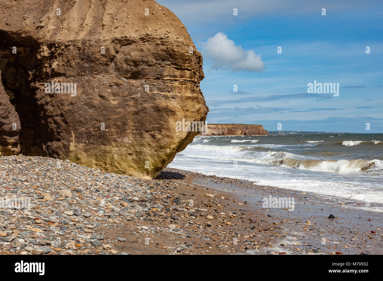 A dramatic cliff formation shows the erosion from the North Sea, Seaham ...