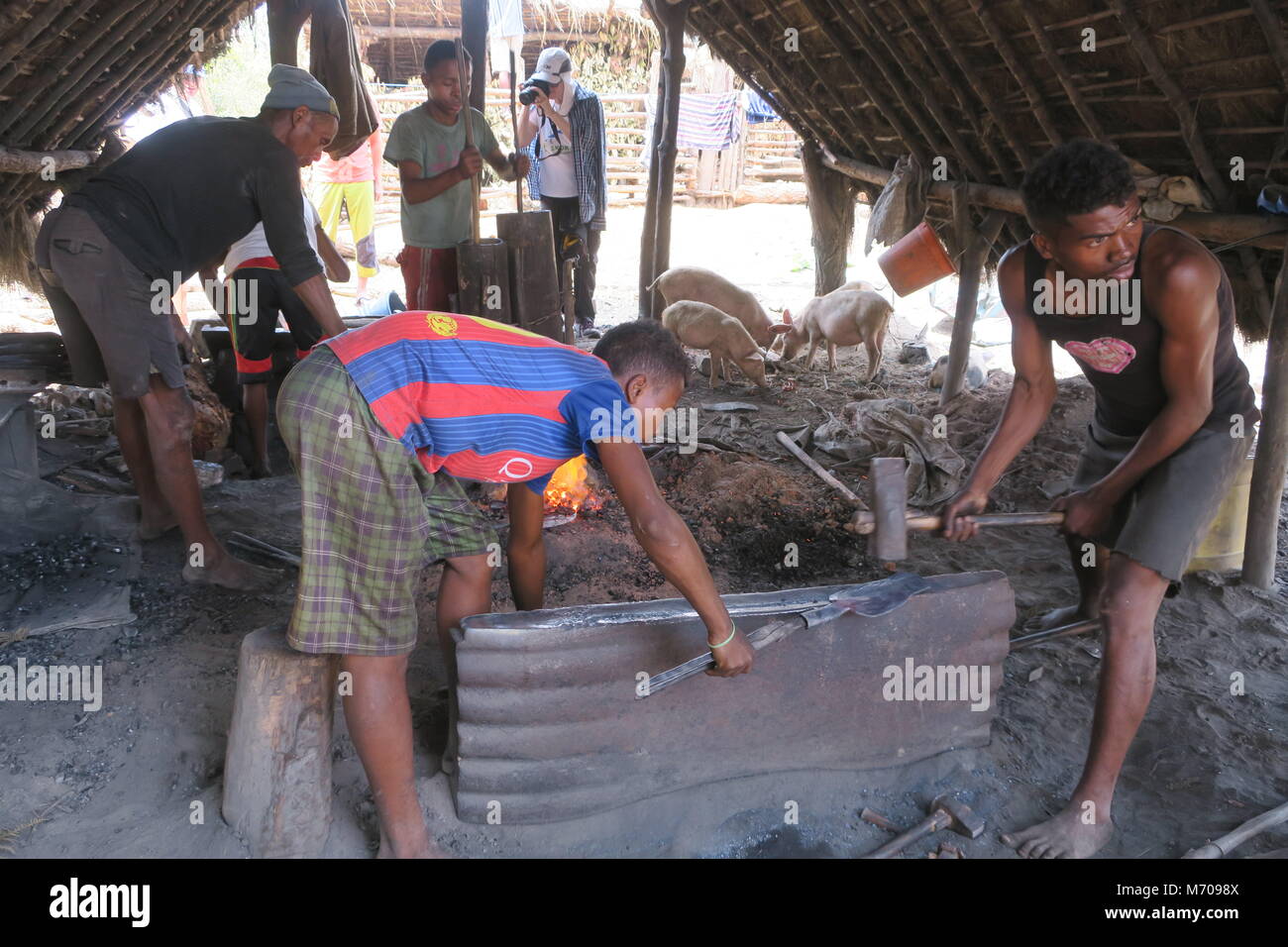 At iron factory, Madagascar. Handmaded garden spade Stock Photo - Alamy