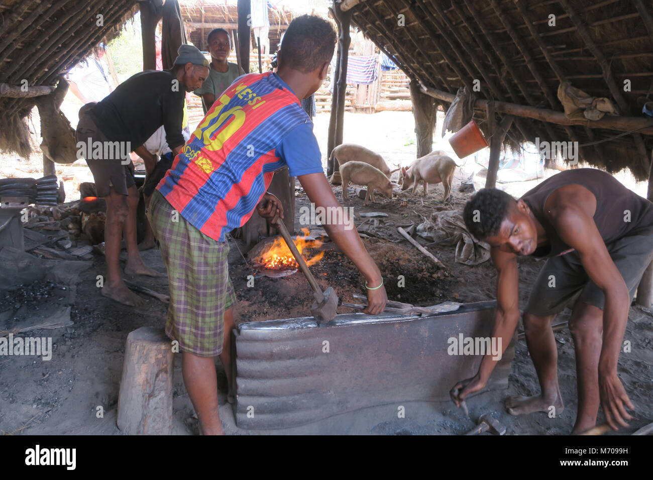 At iron factory, Madagascar. Handmaded garden spade Stock Photo - Alamy