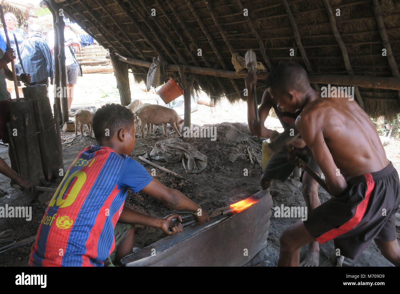 At iron factory, Madagascar. Handmaded garden spade Stock Photo - Alamy